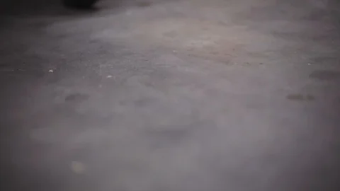 Wheelbarrow and working shoes walking by... | Stock Video | Pond5