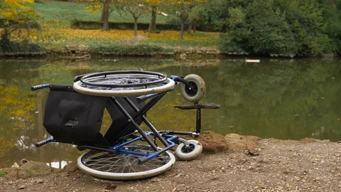 wheelchair overturned to the ground and... | Stock Video | Pond5