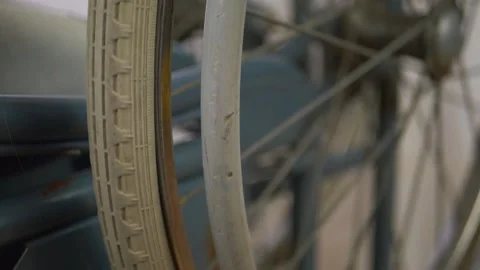 Wheelchair wheel spinning slowly side vi... | Stock Video | Pond5