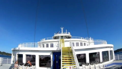 Wheelhouse and passengers on deck of Tor... | Stock Video | Pond5