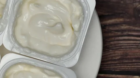 Whipped Soft Cottage Cheese In Four Plas... | Stock Video | Pond5