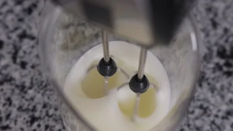 Whipping cream for cake in the container | Stock Video | Pond5