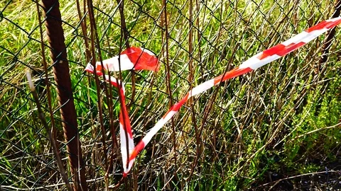 white and red perimeter tape to delimit ... | Stock Video | Pond5