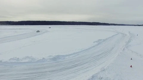 White car drives by ice track near tent ... | Stock Video | Pond5