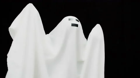 White cast in sheet on black background.... | Stock Video | Pond5