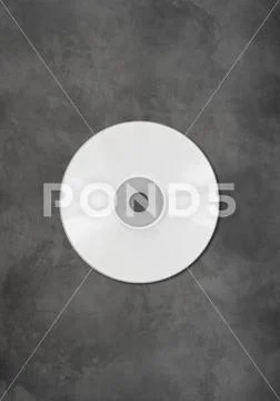 White CD - DVD mockup template isolated on concrete background: Graphic ...