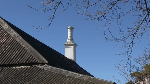A white chimney of a haunted house | Stock Video | Pond5