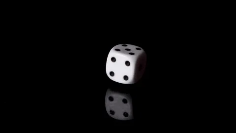 White dice rolls a five in slow motion, ... | Stock Video | Pond5