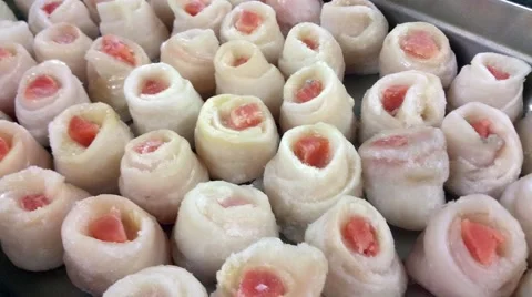 White fish rolls filled with salmon, pre... | Stock Video | Pond5