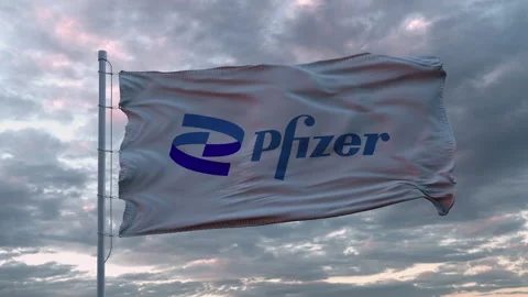 White flag with the new Pfizer logo wavi... | Stock Video | Pond5