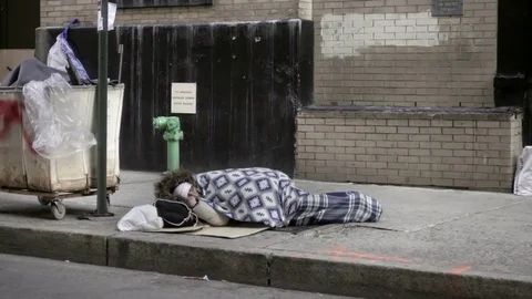 white homeless woman sleeping on sidewal... | Stock Video | Pond5