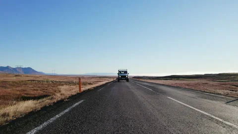 White Land Rover Defender Driving On Emp... | Stock Video | Pond5