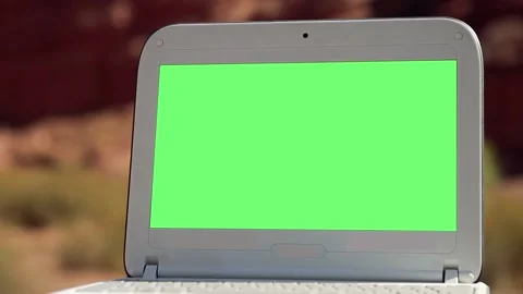 White Laptop with Green Screen Outdoors. | Stock Video | Pond5