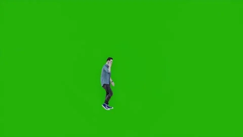 White man on green screen walking and ta... | Stock Video | Pond5