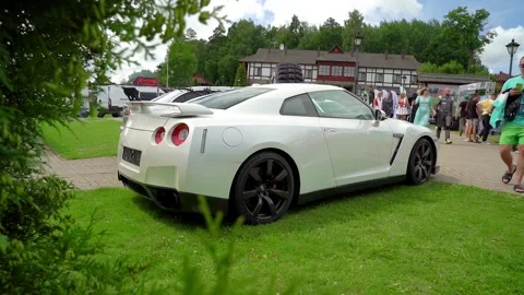 White Nissan GTR R35. Parked On The Gras... | Stock Video | Pond5