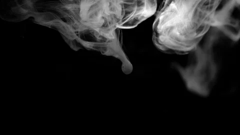 White particles and ink slowly moving on... | Stock Video | Pond5