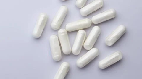 white pharmaceutical capsules, rotation ... | Stock Video | Pond5