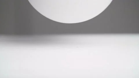 White plane sphere bouncing off a white ... | Stock Video | Pond5