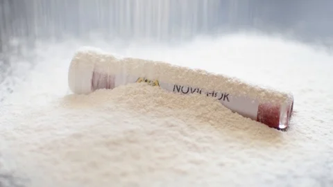 White powder reveals a test tube with bl... | Stock Video | Pond5