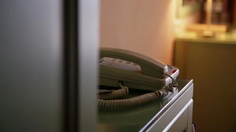 White push-button telephone in hotel roo... | Stock Video | Pond5