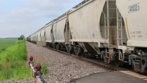 White rail cars approaching a railroad c... | Stock Video | Pond5