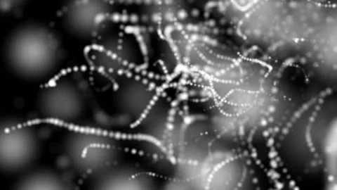 white round particles moving on a black ... | Stock Video | Pond5