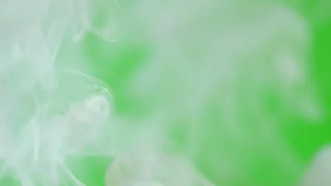 White smoke floating slow motion on gree... | Stock Video | Pond5