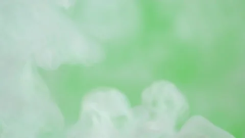 White smoke floating slow motion on gree... | Stock Video | Pond5