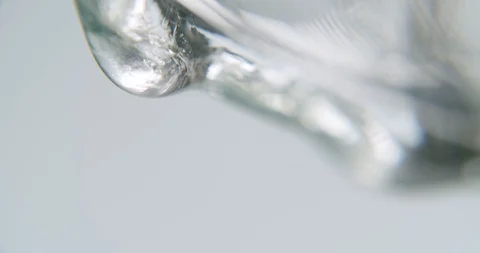 White transparent fluid forming slowly a... | Stock Video | Pond5