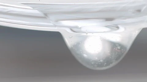 White transparent liquid forming slowly ... | Stock Video | Pond5