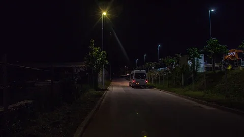 A white van driving down a road at night... | Stock Video | Pond5
