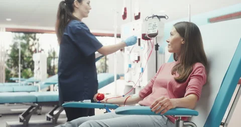 White Woman Donating Blood Nurse With Ta... | Stock Video | Pond5