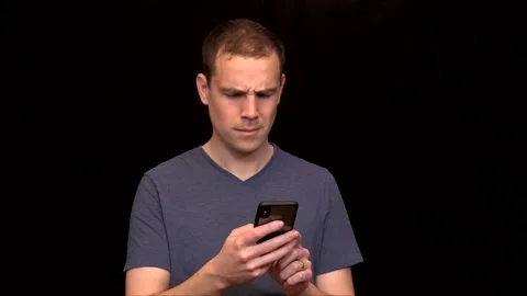 Confused Man With Phone Stock Videos – Royalty-Free HD & 4K Videos
