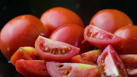 Whole and Quartered cherry tomatoes agai... | Stock Video | Pond5