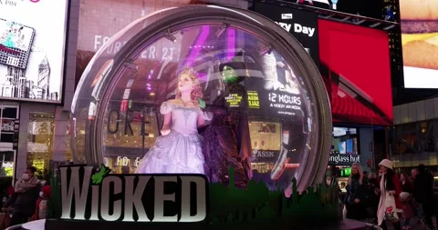 Wicked advertisement at Times Square. Ni... | Stock Video | Pond5