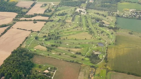 Wide aerial view of entire golf course i... | Stock Video | Pond5