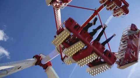 Wide low angle shot carousel atraction r... | Stock Video | Pond5