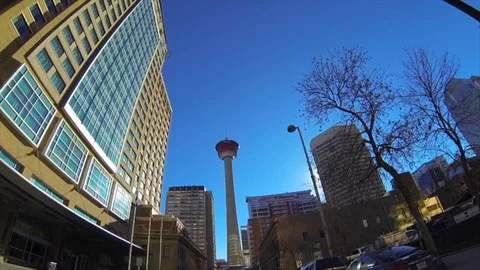 Wide low angle shot over city with tower... | Stock Video | Pond5