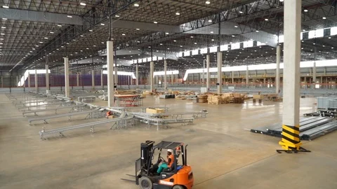 Wide pan over large factory warehouse di... | Stock Video | Pond5