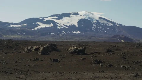 Wide panning shot of rocks in field near... | Stock Video | Pond5