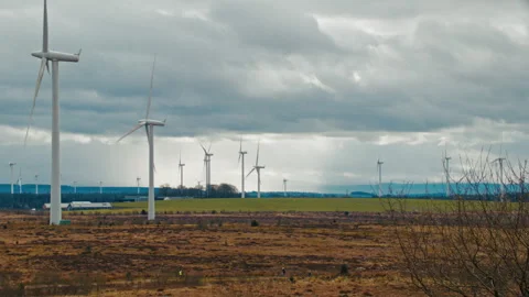 Wide Profile Shot Of Wind Turbines In La... | Stock Video | Pond5