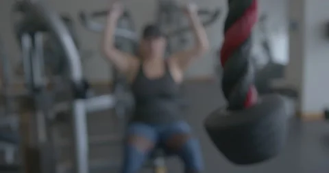 Wide Rack Focus of a Young Woman Using a... | Stock Video | Pond5