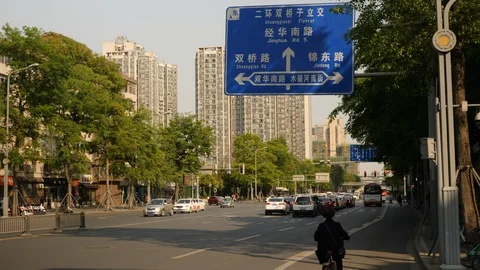 Wide road with traffic sign in Chinese c... | Stock Video | Pond5