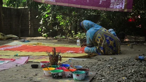 Wide shot of an artist woman drawing ove... | Stock Video | Pond5