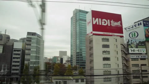 Wide shot of buildings in Japanese city ... | Stock Video | Pond5