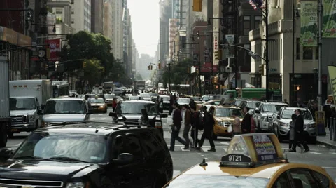 Wide shot of bustling city street / New ... | Stock Video | Pond5