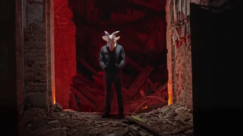 Wide shot of a devil standing in a ruine... | Stock Video | Pond5