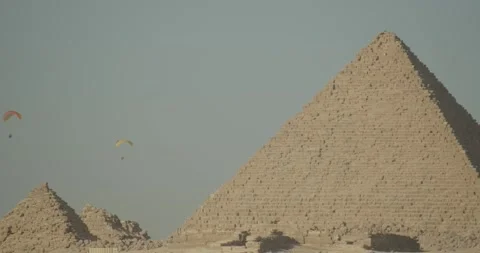 Wide Shot of Giza Pyramids with Two Glid... | Stock Video | Pond5