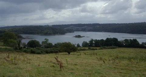 Wide shot of the Menai Strait with Menai... | Stock Video | Pond5
