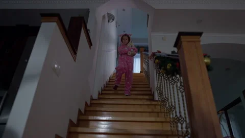 Wide shot stairs with cheerful cute girl... | Stock Video | Pond5